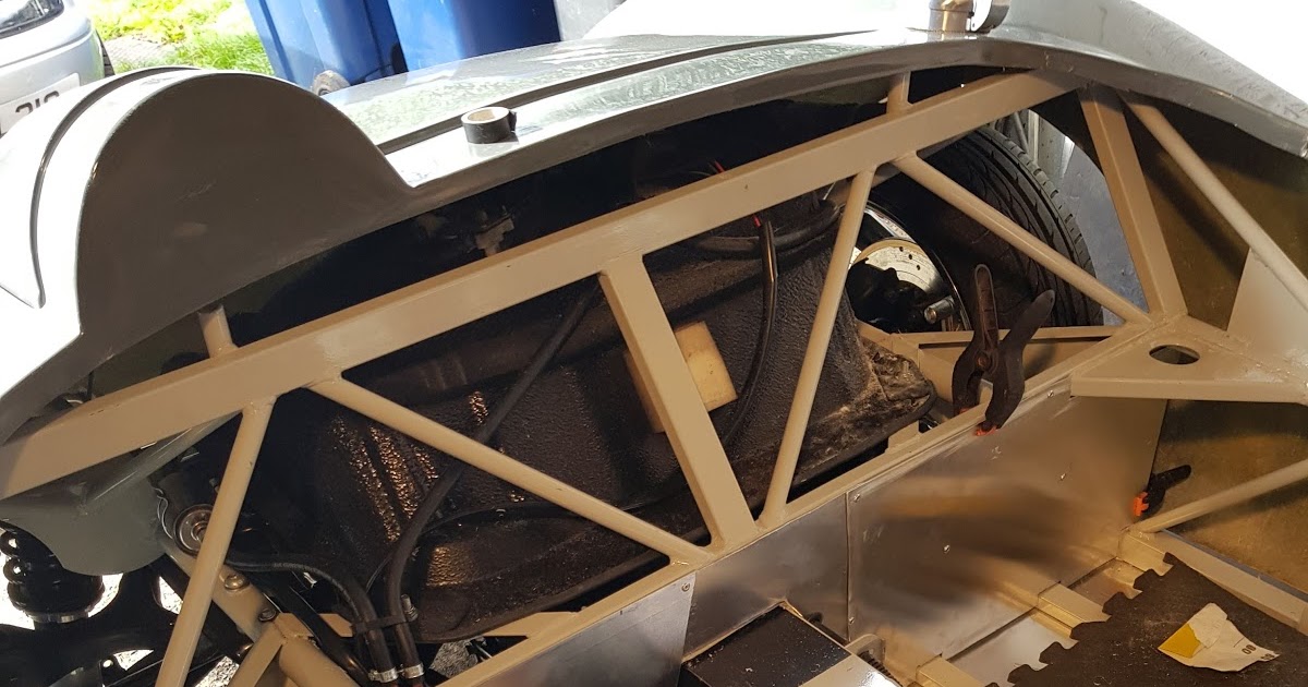 Lower rear bulkhead panels and handbrake fittings