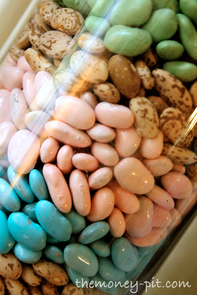 For the egg shapes I attached undecorated beans to a foam egg with hot ...