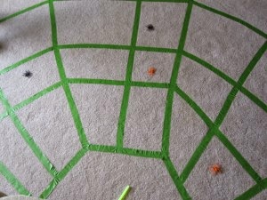 Toddler Halloween Tape Spider Web Game | Munchkins and Mayhem