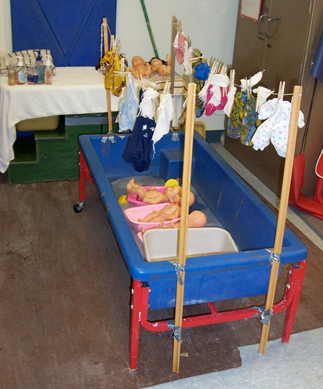 SAND AND WATER TABLES: Baby washing 2016