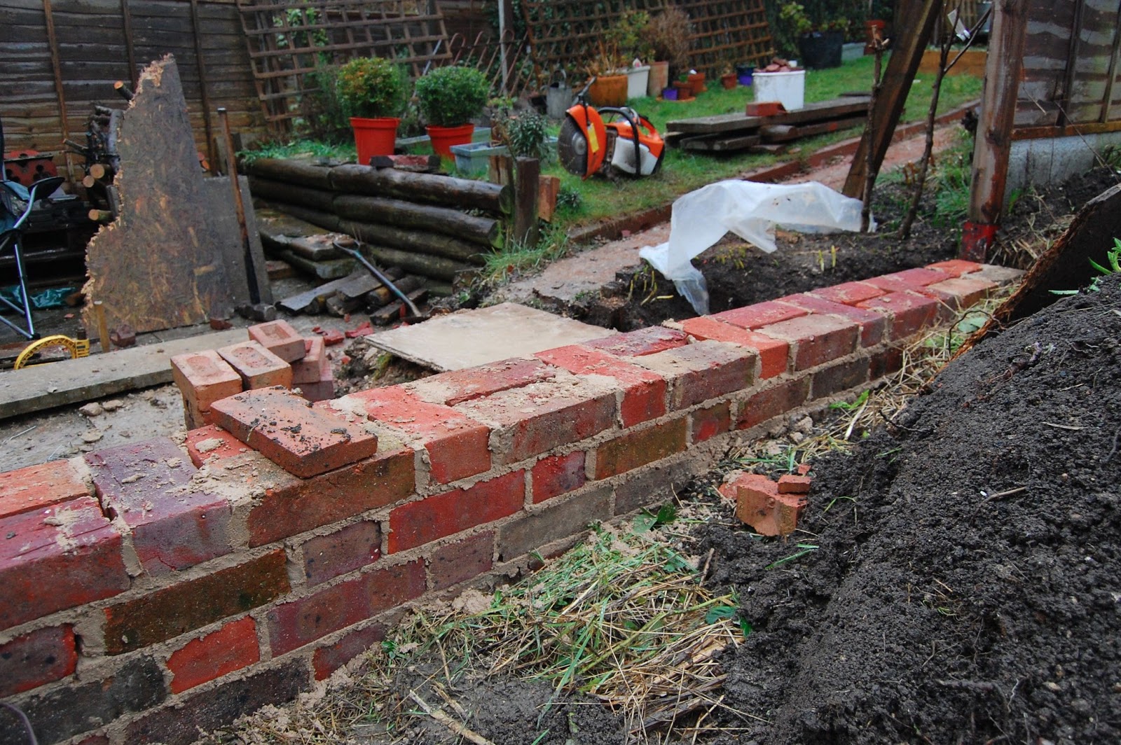 Higher brick piers and curved brick planters