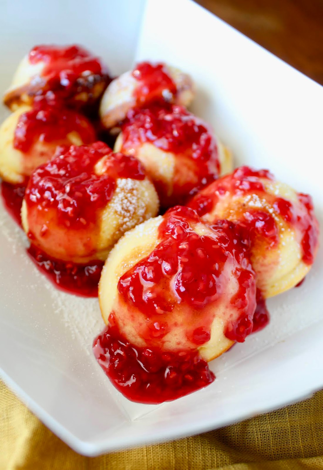 Cream Cheese Filled Ebelskivers with Fresh Raspberry Sauce