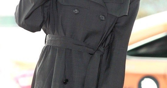 Hani gears up with a smile and a mask for the airport