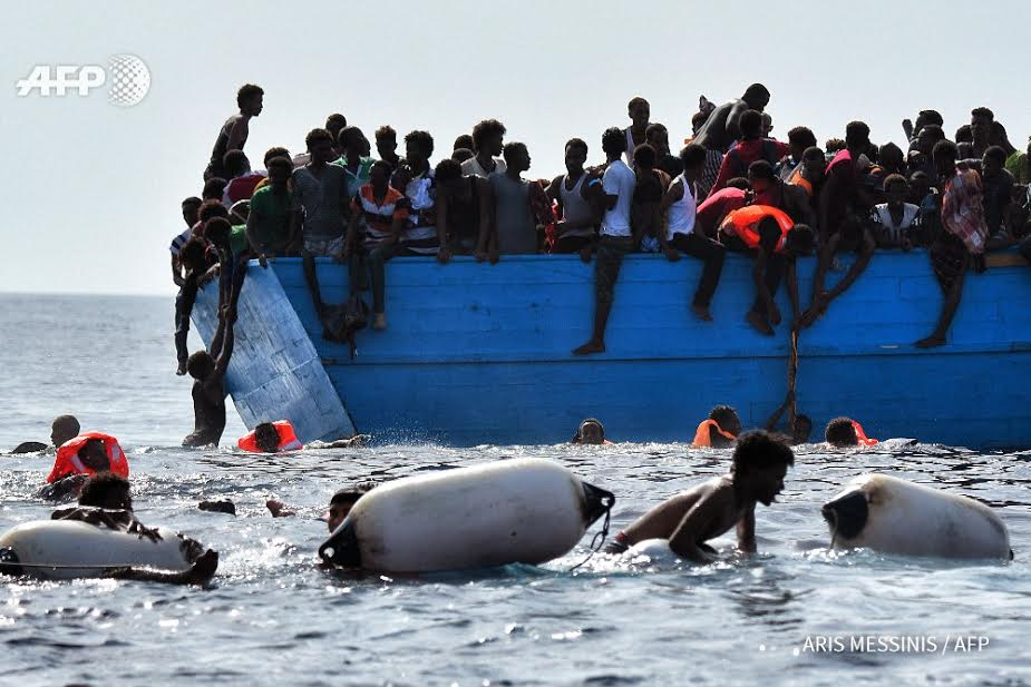 Photos of African migrants stepping over dead bodies after being ...