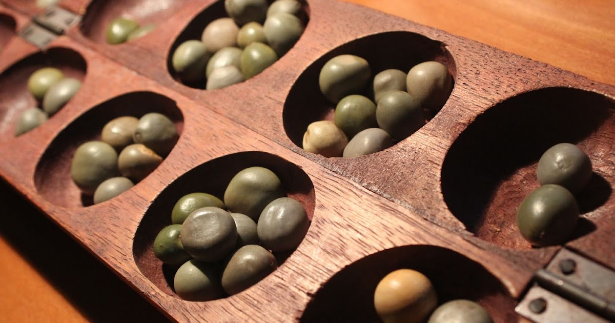 In Black and White: How to play: Mancala