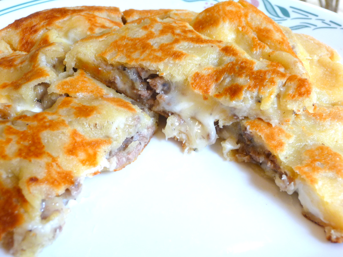 MOLTEN CHEESE BEEF OR CHICKEN QUESADILLAS