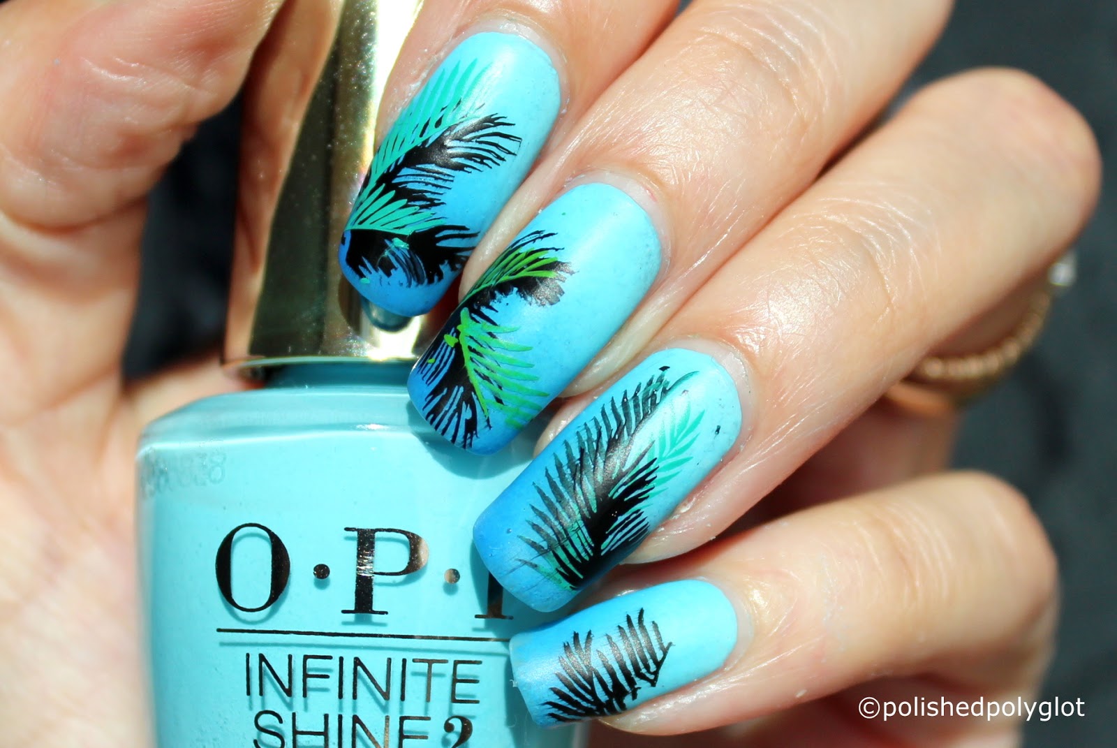 White And Blue Pom Tree Nails