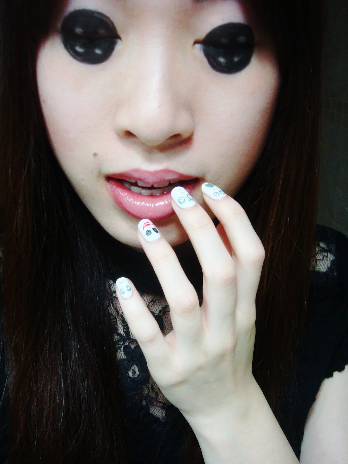 The Nail Artiste: If a button nose is cute, why are button eyes creepy?