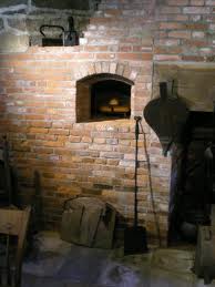 The Two Sides Of Divinity: Baking Bread In An Oven Fireplace