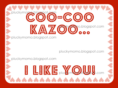 4. Pull 1.5-2" long piece of scotch tape. Place tape unto kazoo right ...