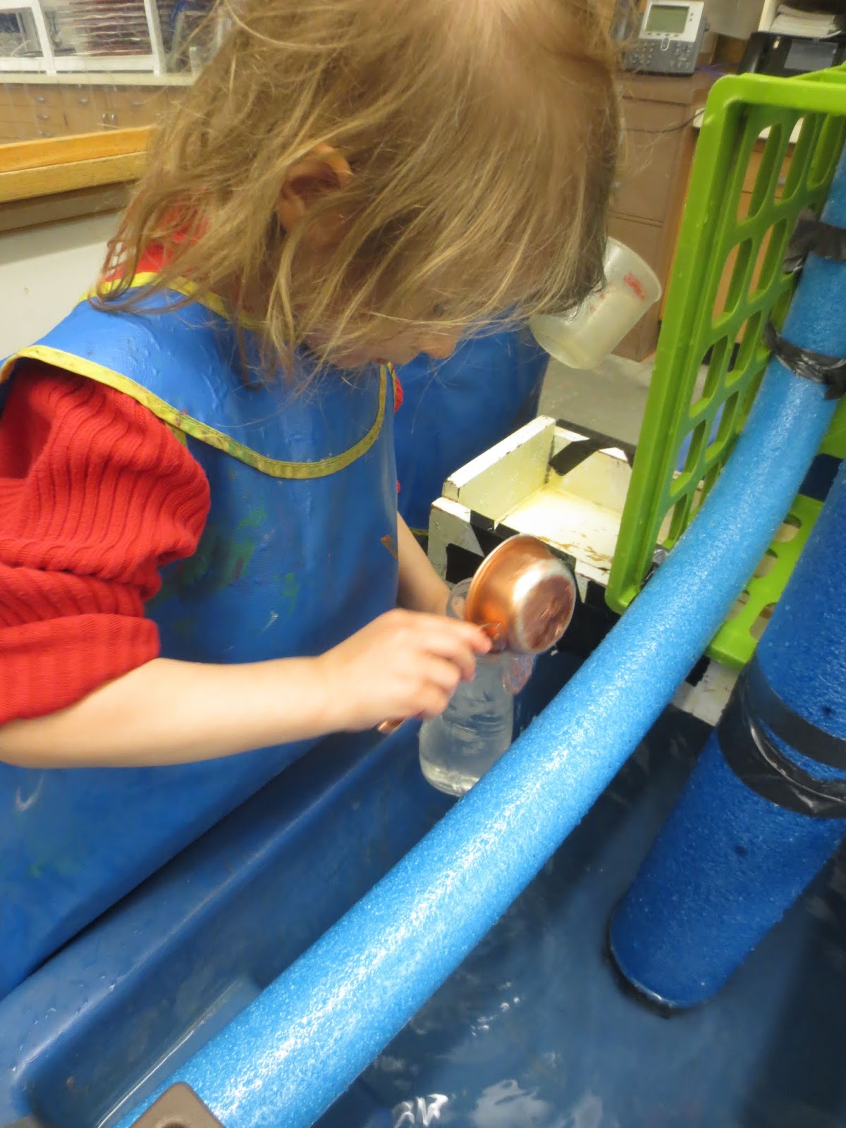 SAND AND WATER TABLES: The art of pouring