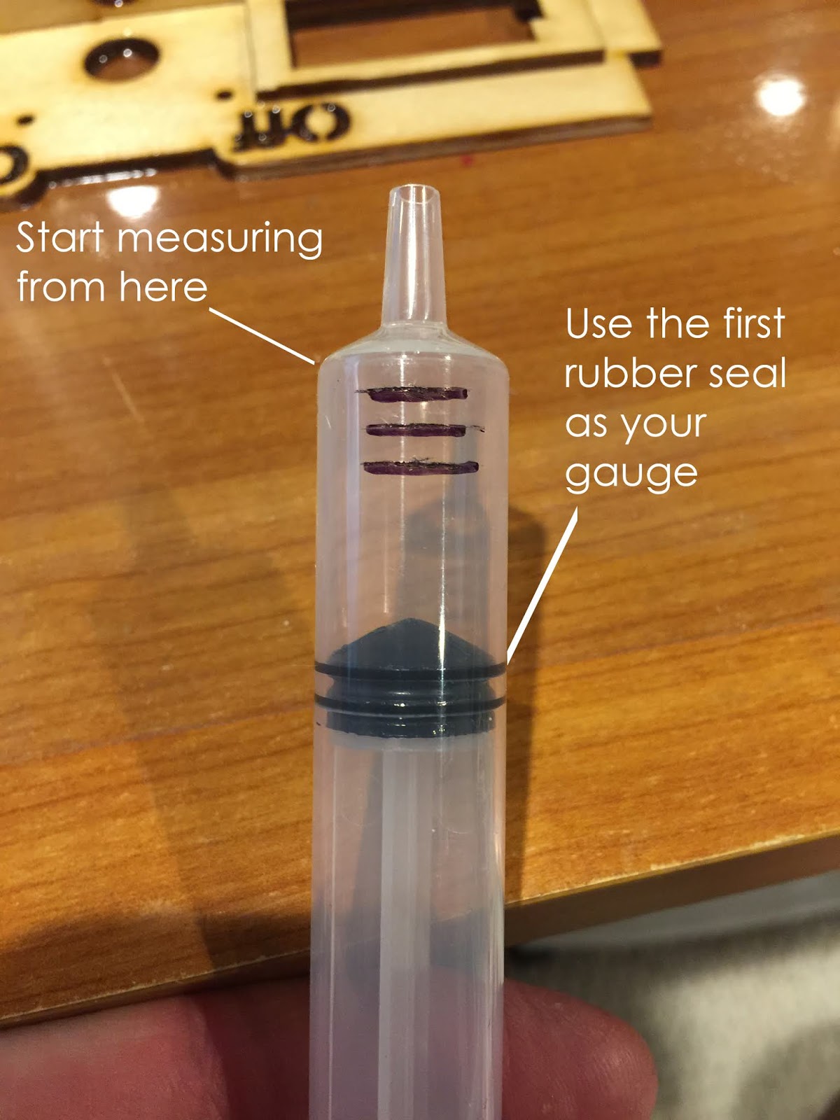 Small batches of WEST System Epoxy using marked syringes