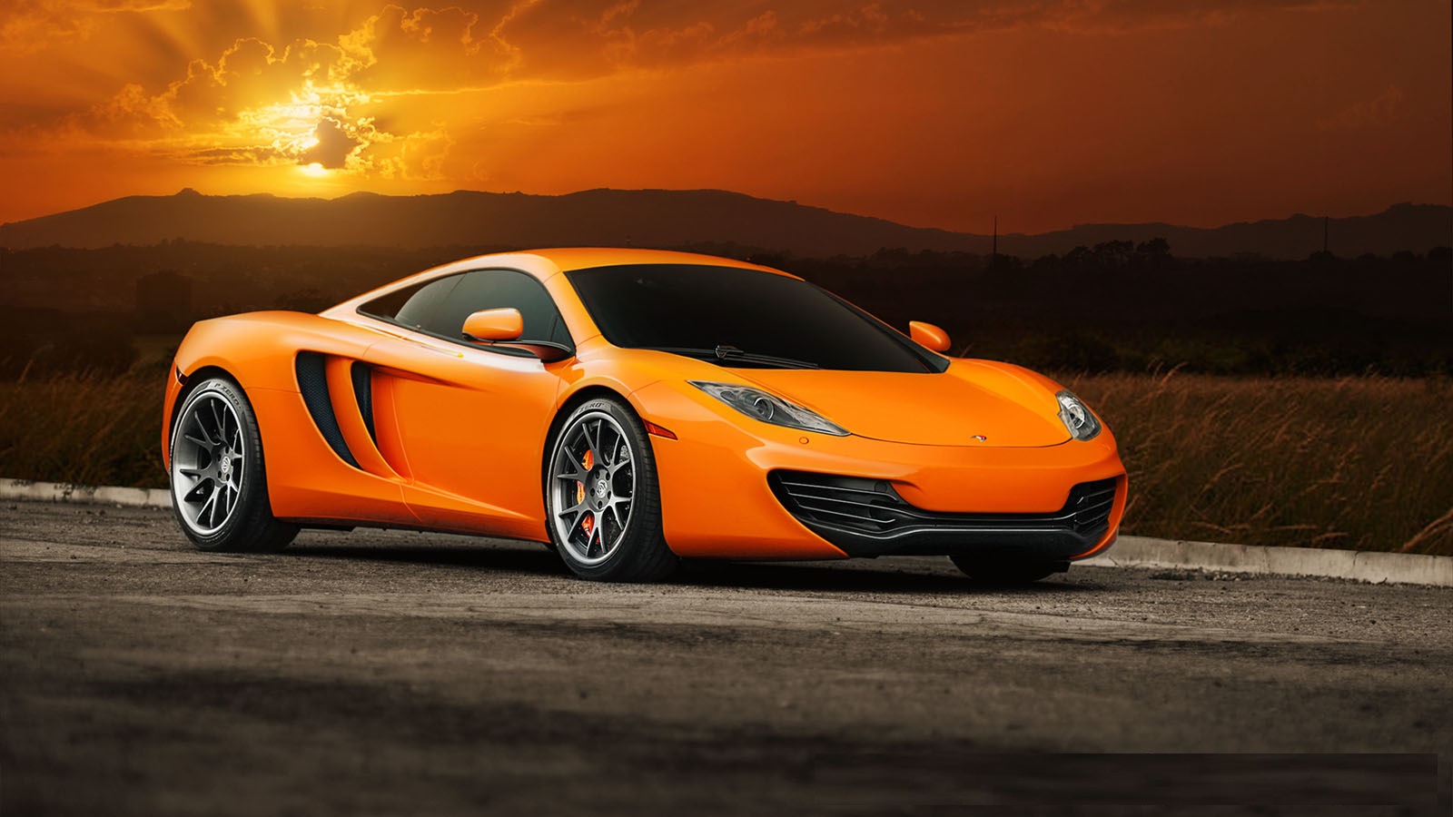 Autos deportivos con fondo negro - Imagui