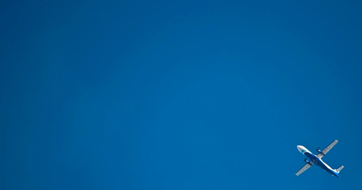 Aeroplane in Blue Sky Background for Corporate Presentations