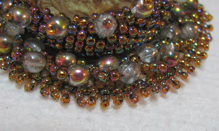 A Bezel Effects bead embroidered pendant