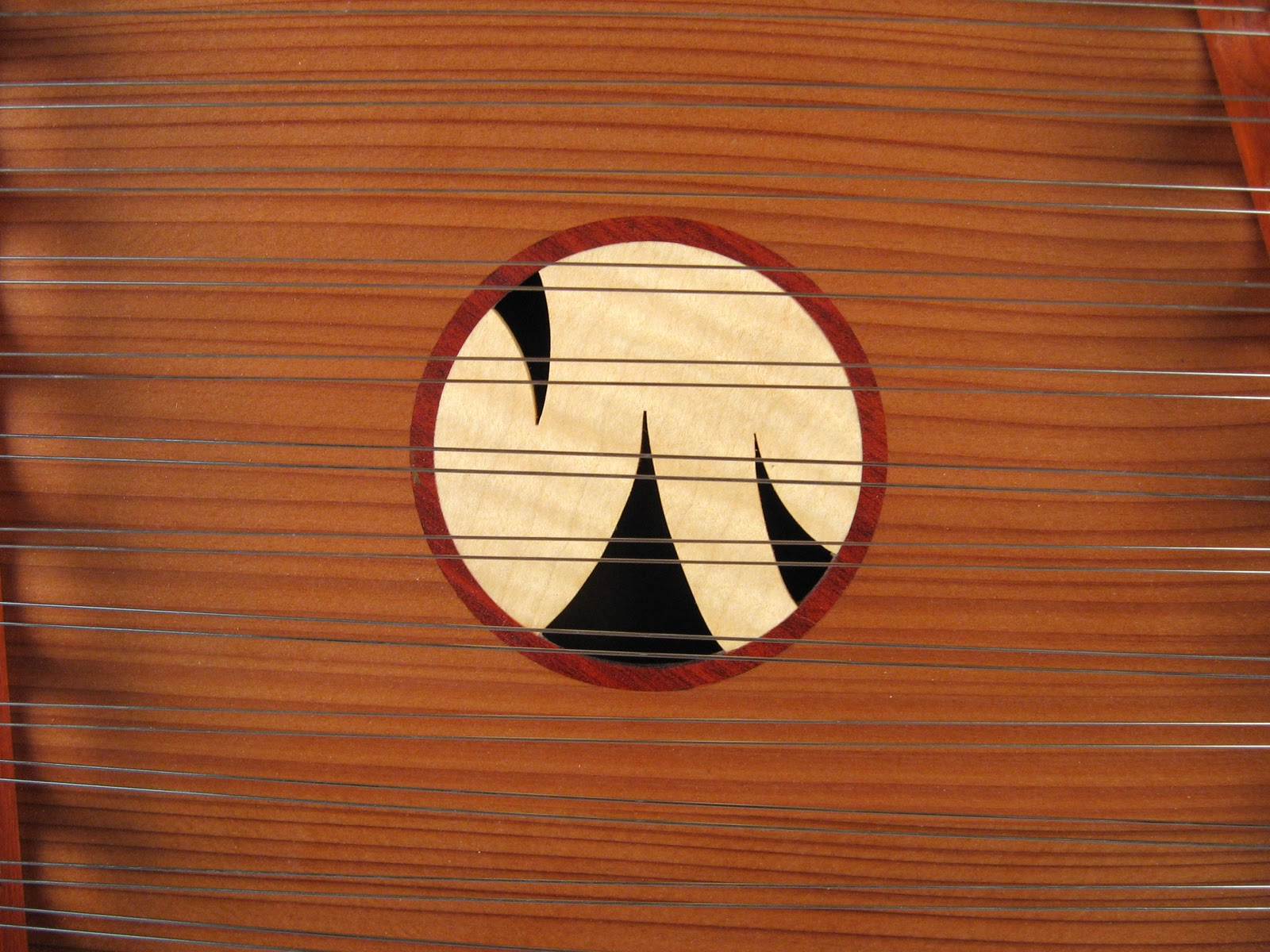 James Jones Instruments: Sound Hole Designs