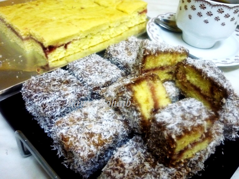 Rania @ Work with sugar'n spice: **Soft and Spongy Lamingtons**