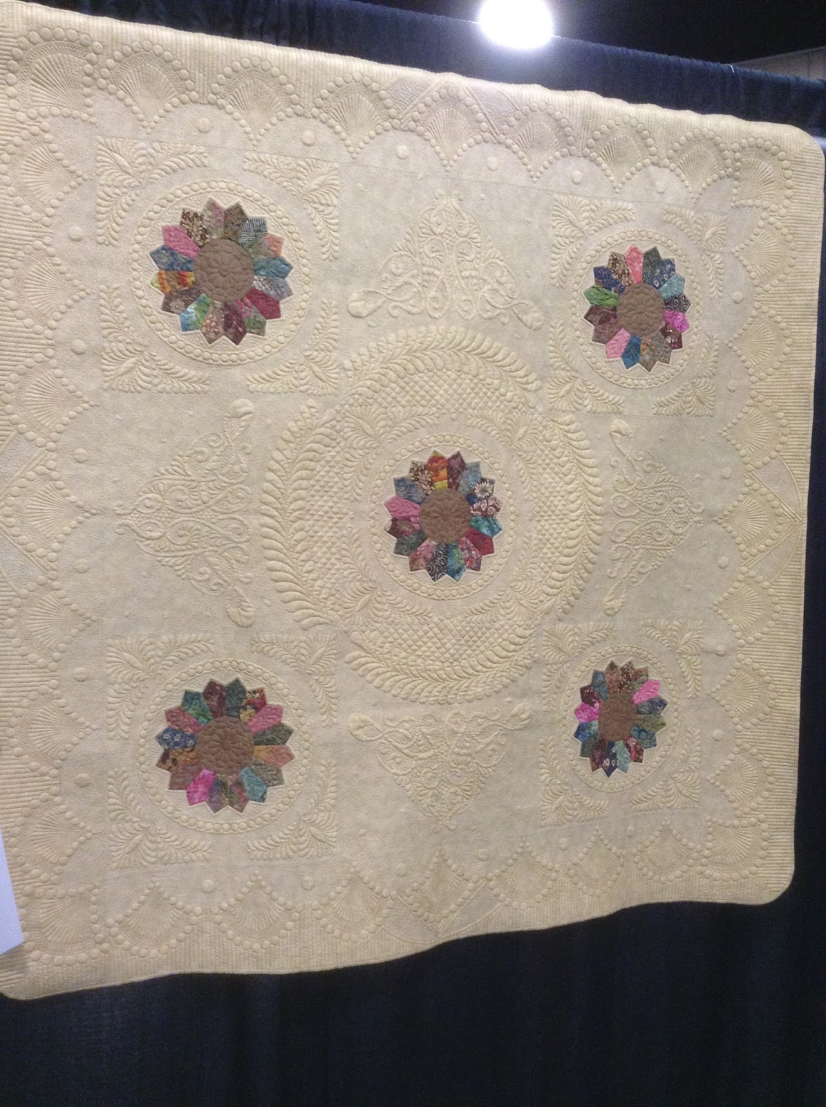 Timeless Traditions: Recent local quilt show.....