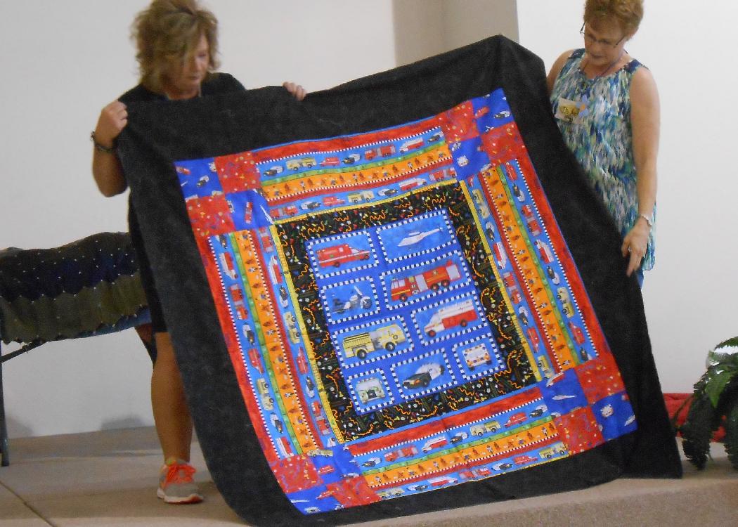 Clay Center Piotique Quilters Guild: What makes a Man's Quilt?