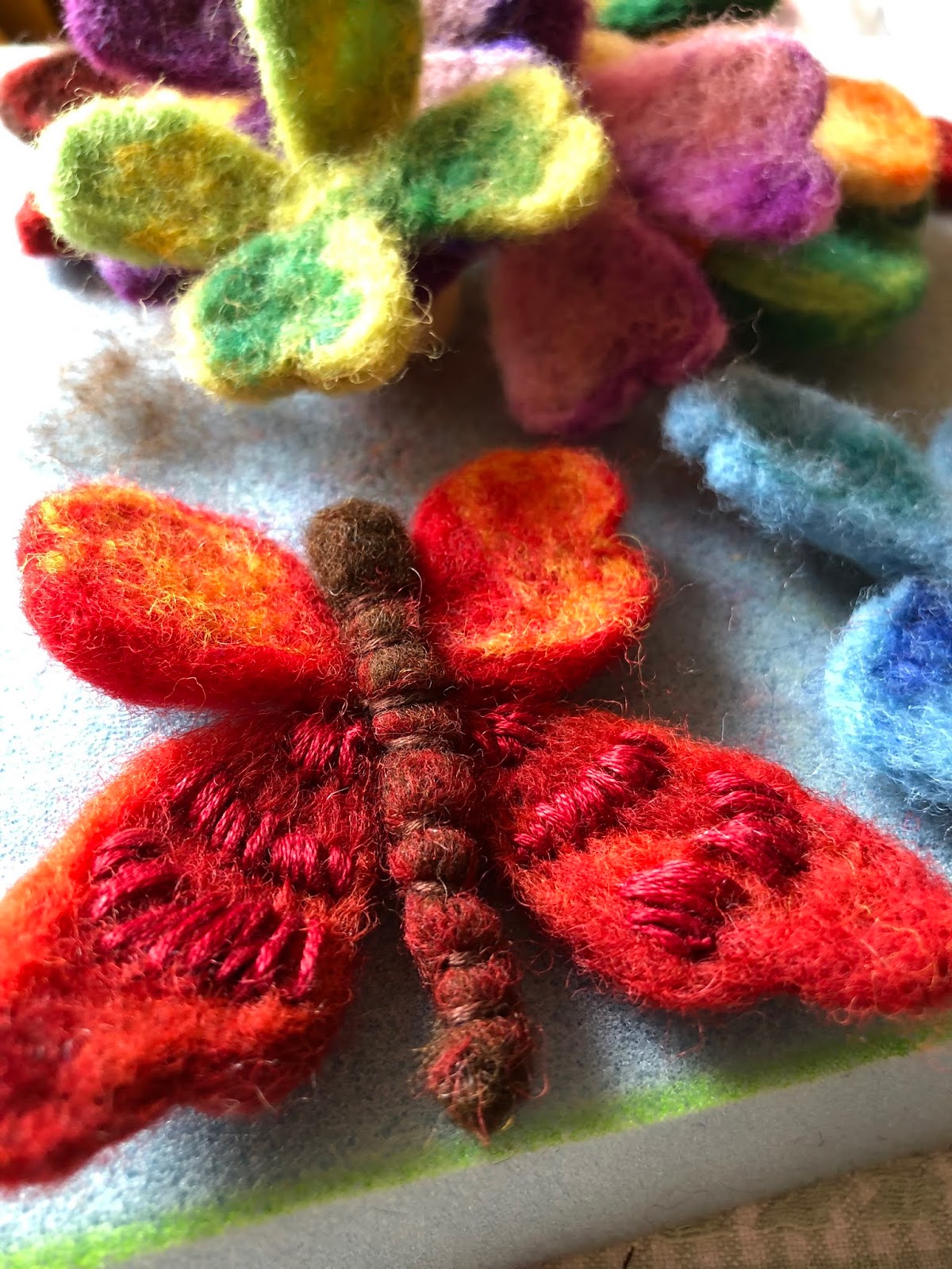 felted butterflies from scraps of wool!