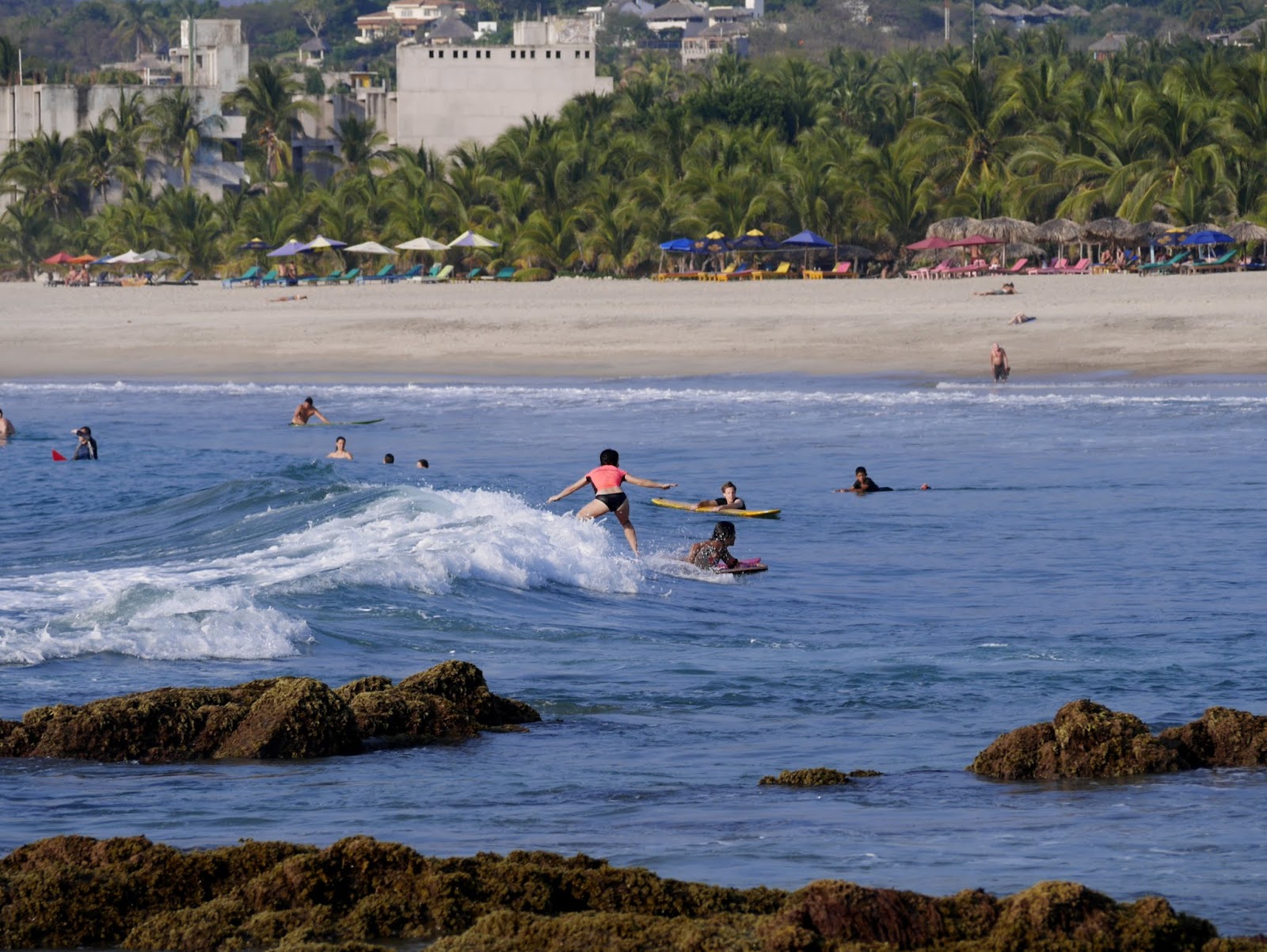 Surfing La Punta at Playa Zicatela - Backwoods Mama