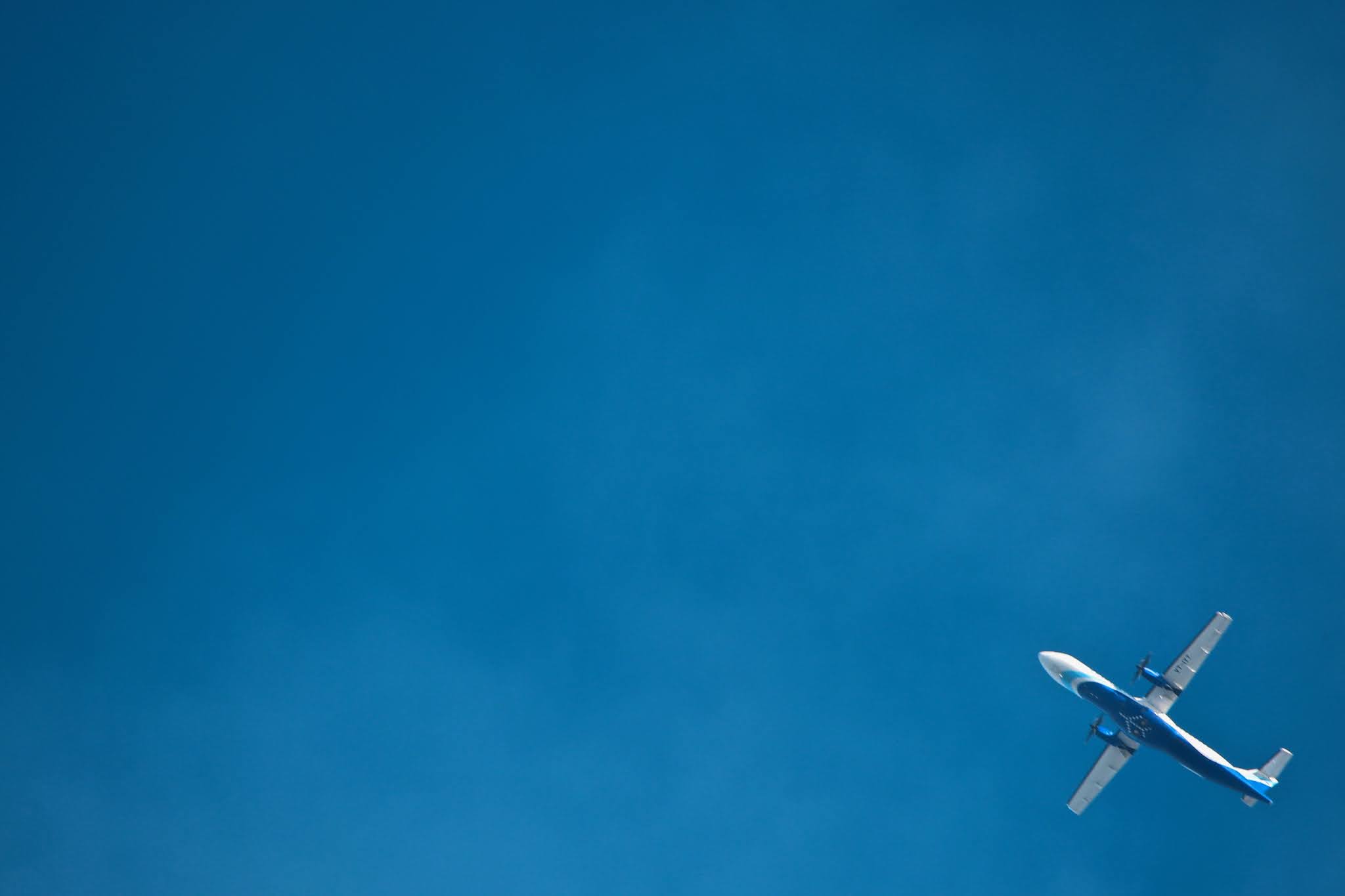 Aeroplane in Blue Sky Background for Corporate Presentations