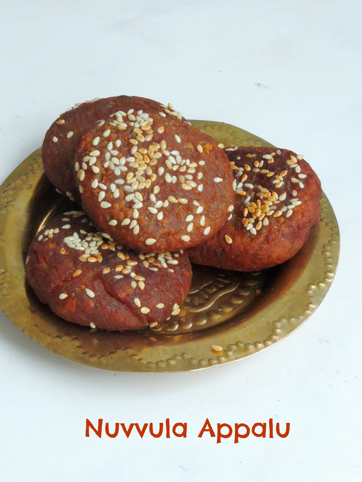 Priya's Versatile Recipes: Nuvvula Appalu/Deep Fried Wheatflour Patties