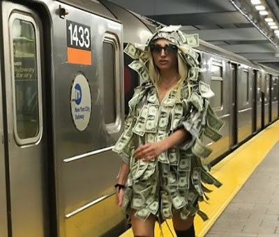 MODEL TAKES TO STREETS WEARING DRESS MADE OF MONEY AND ENCOURAGES ...