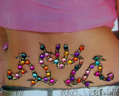 Art Human: 3D Snakes Tattoo on Lower Back