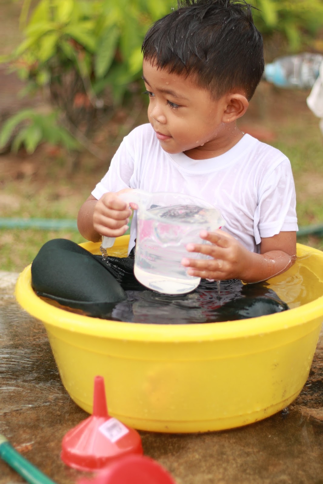 Montessori: Pouring Water Through Funnel Activity | My Home My School
