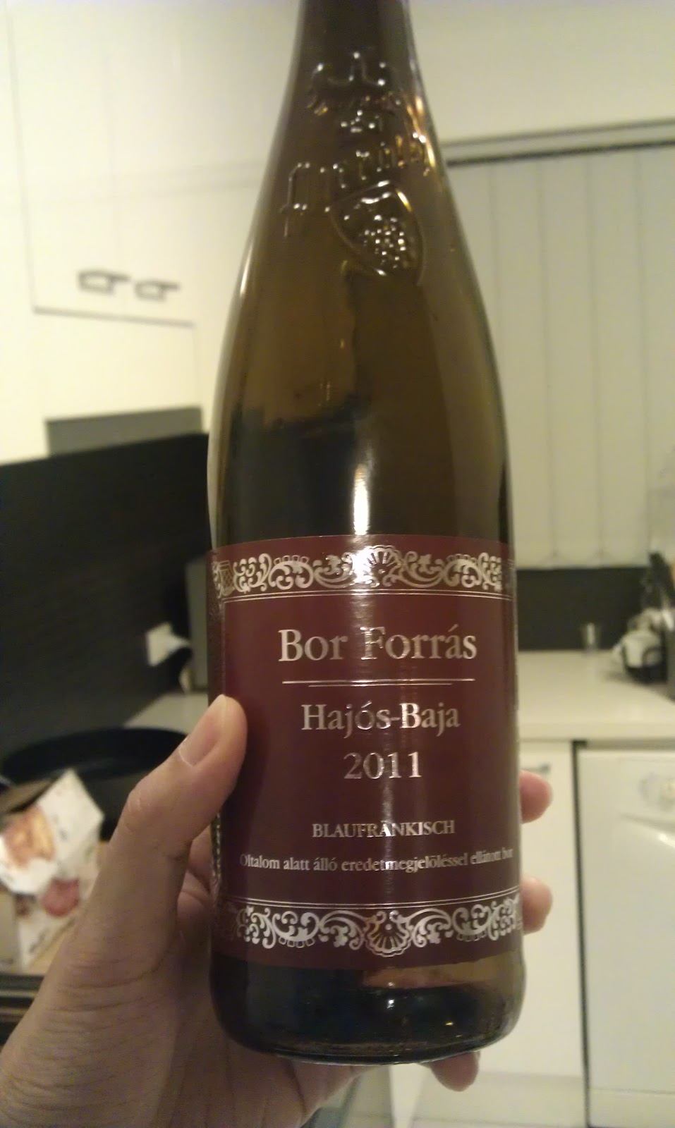 A GLASS OF RED GRAPES