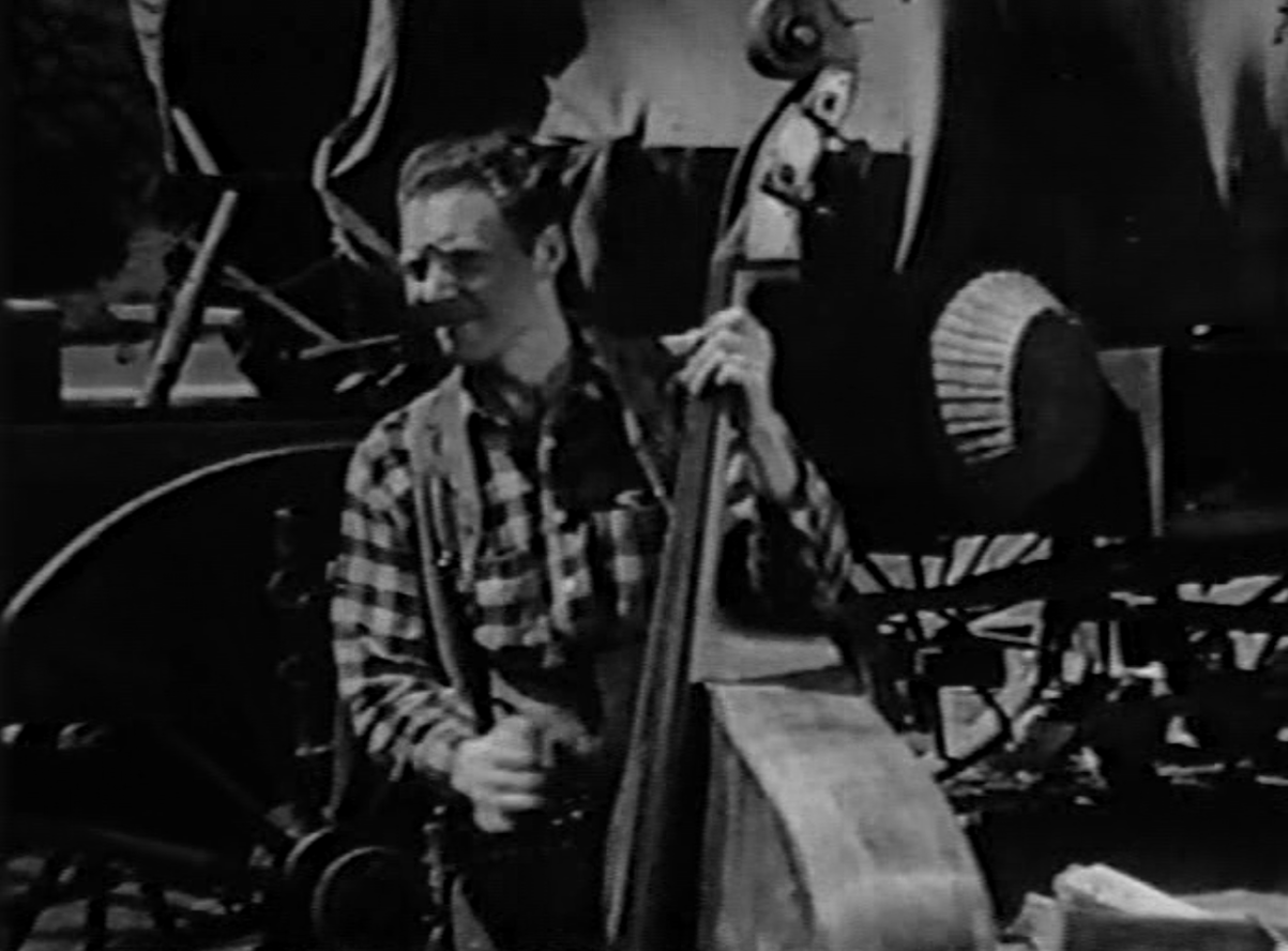 Iverson Movie Ranch: Charles Starrett scrambles over movie rocks in ...