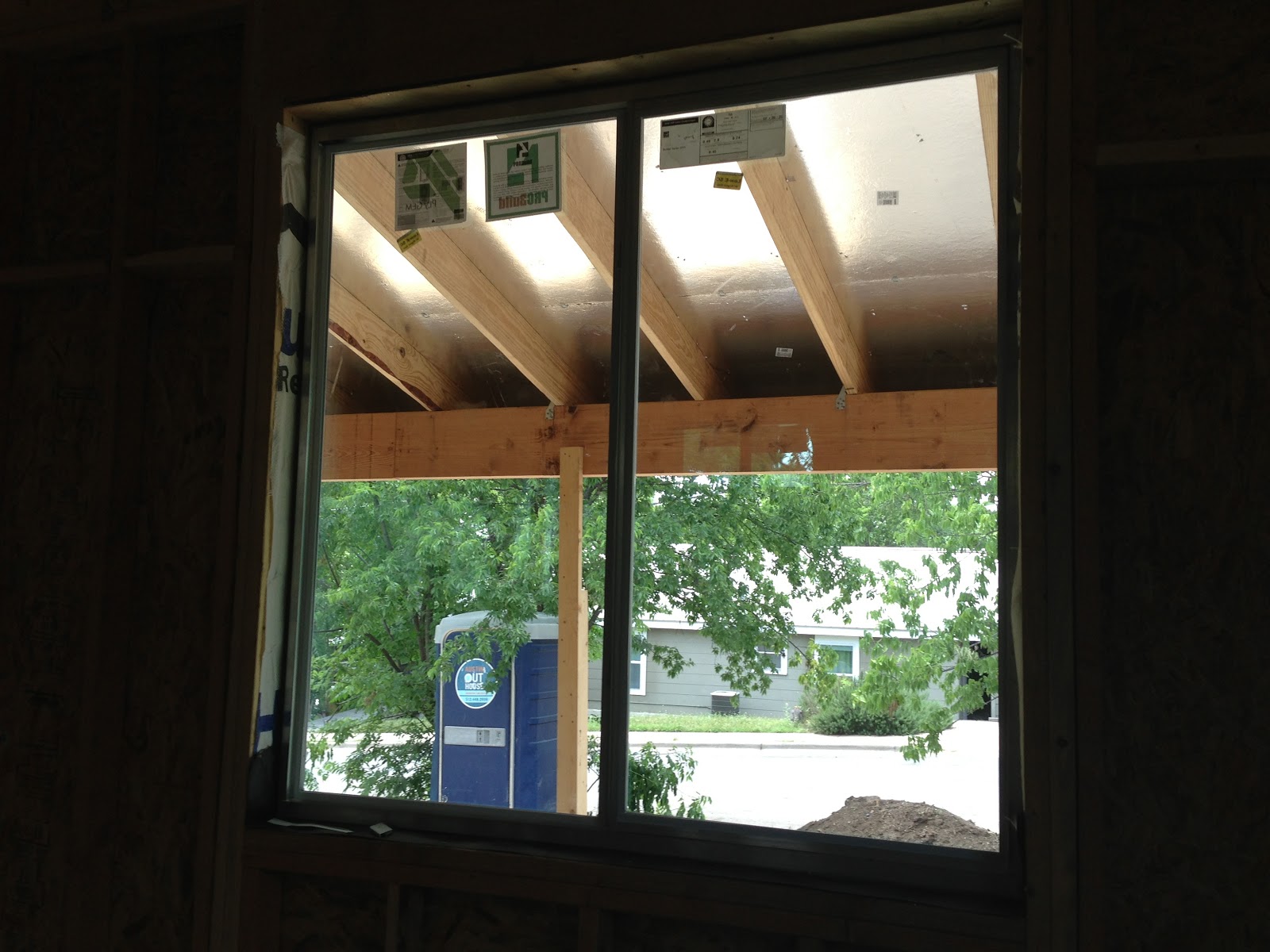 This New House: House Wrap, Windows, and Siding begins