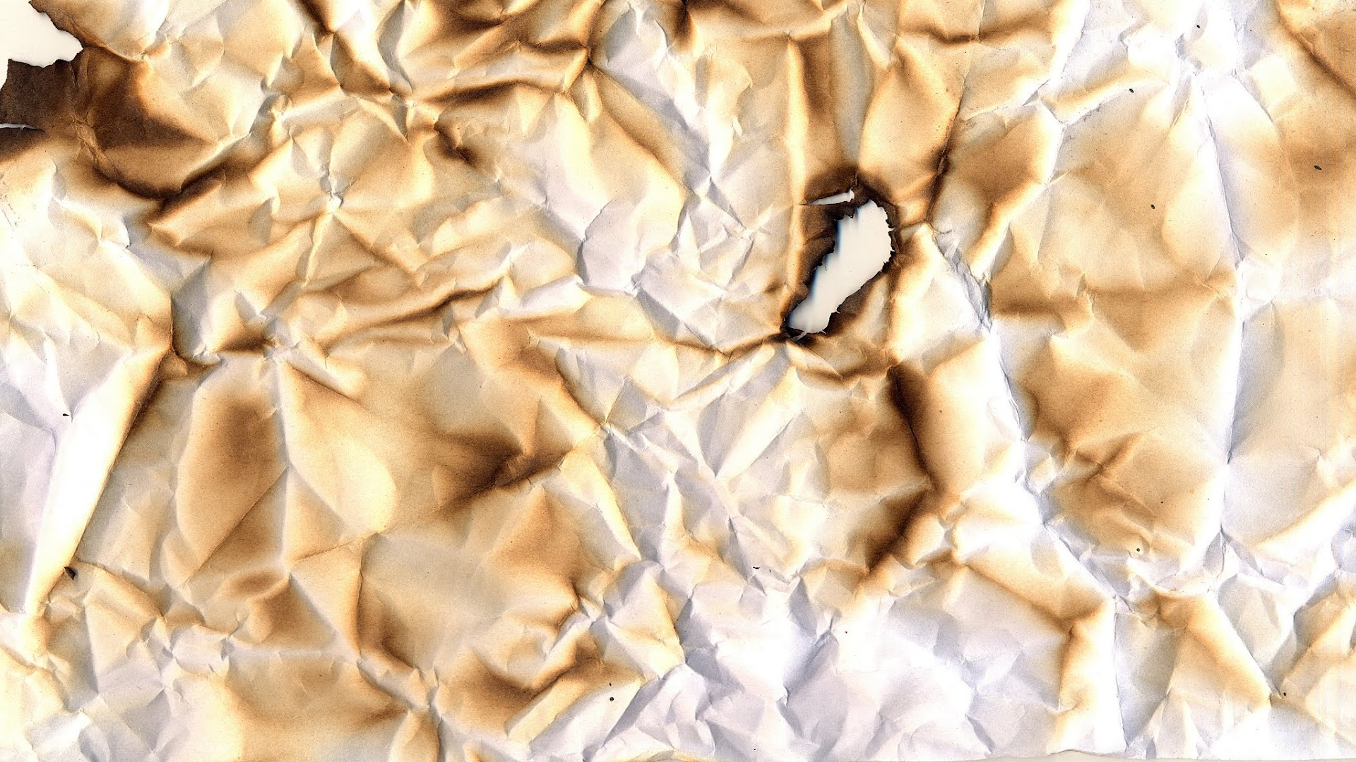 Burnt Paper Background Powerpoint