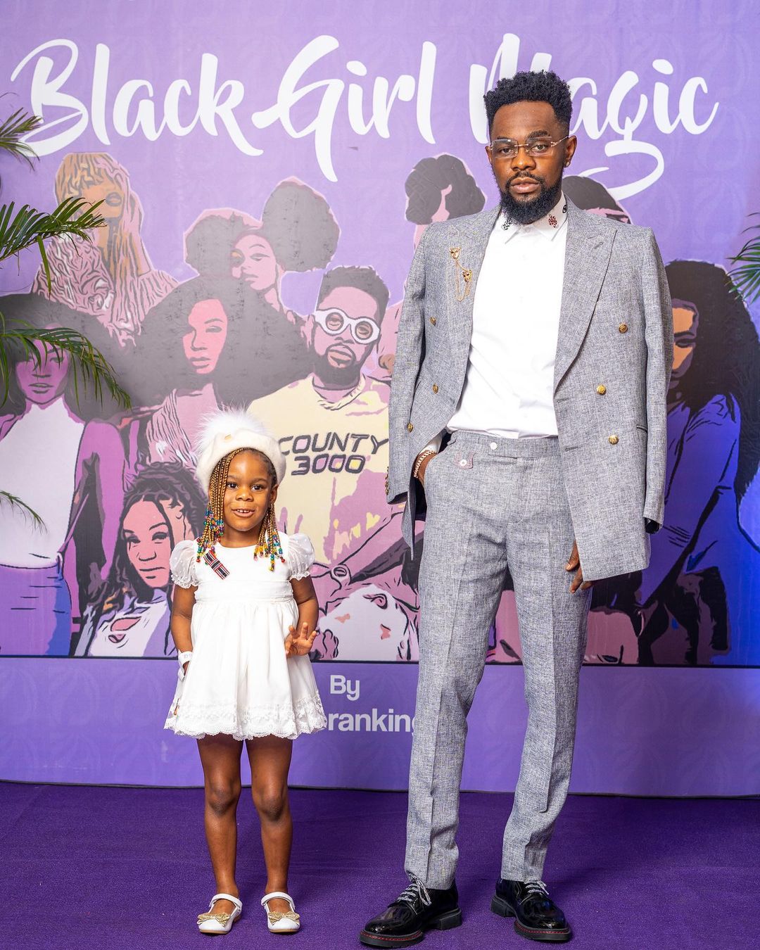 Photo of Patoranking And his daughter at a Darling Hair event
