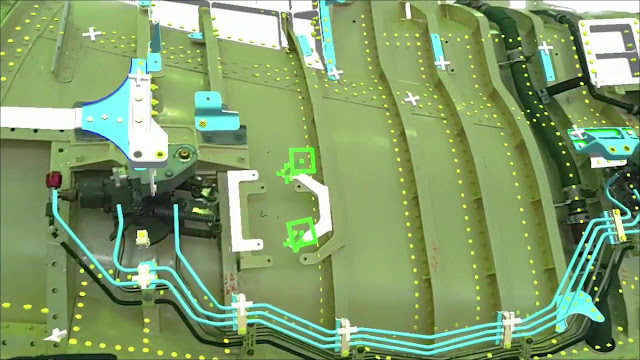 The Dead District: Workers on assembly line of Su-57 use augmented reality