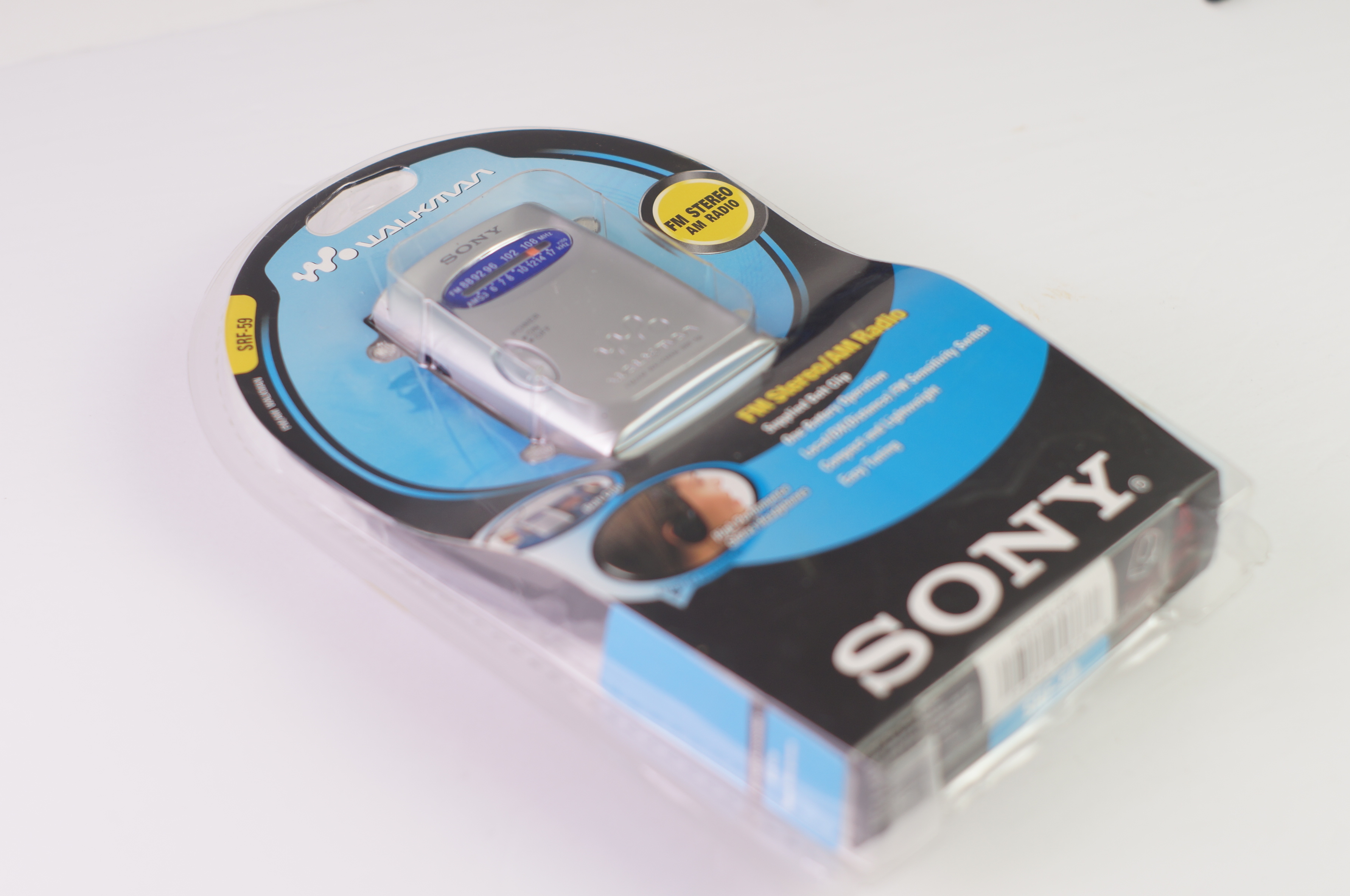 Sony Walkman SRF-59 AM / FM Stereo with Local/Distant DX Switch