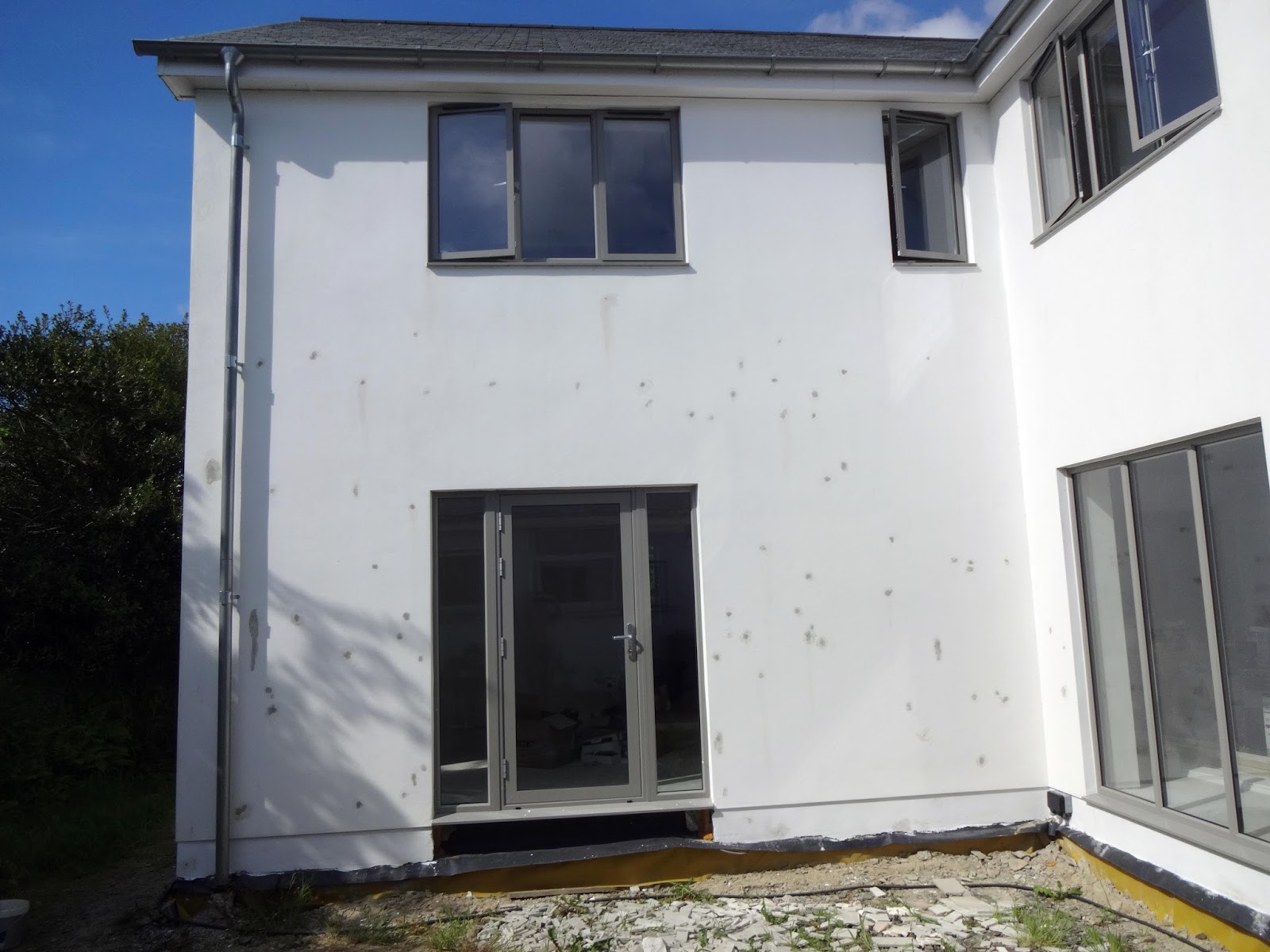 V&A's Home Build: Outside: front door step / render repairs