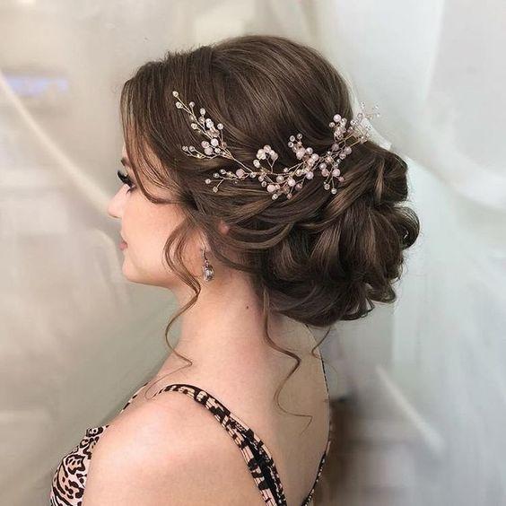 Soft raised hairstyles for engagement depending on your wedding dress