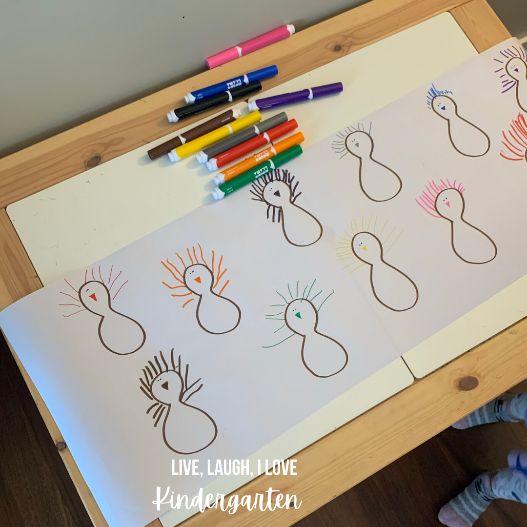 Next, mygirls took their markers and drew turkey feathers on each turkey.