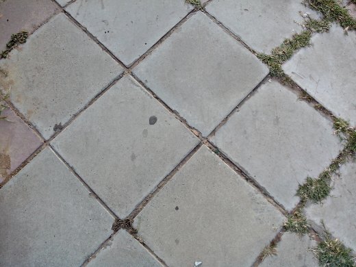 A typical stone tiled foot path in New Delhi