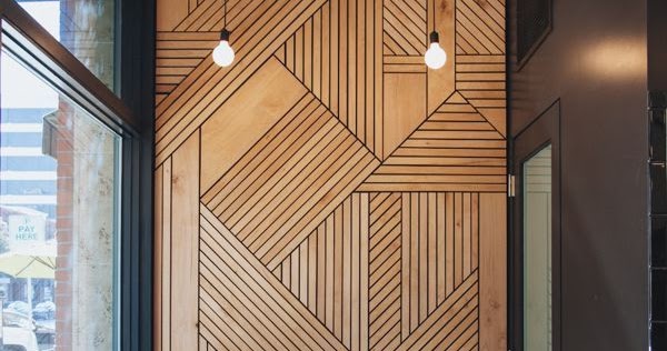 Paredes decoradas con madera en diseños geométricos / PRÁGMATIC