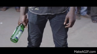 Man breaks bottle on his head for Dotman's "Yes Melo" music video ...