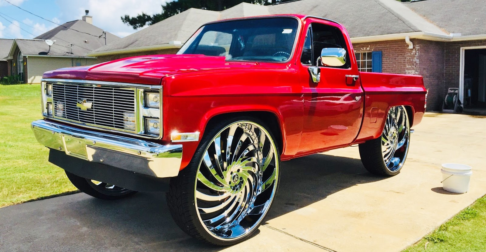 Ace-1: Candy Red Chevy C10 Shortbed Truck on 34" DUB Delish Wheels