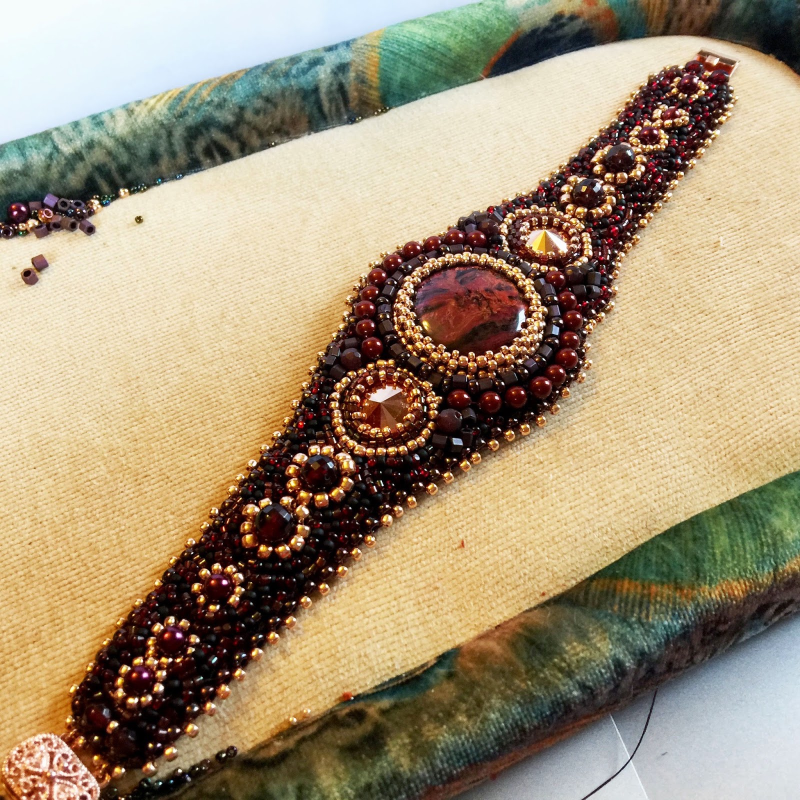 Wedding bracelet: bead embroidered acrylic cabochon in burgundy and ...