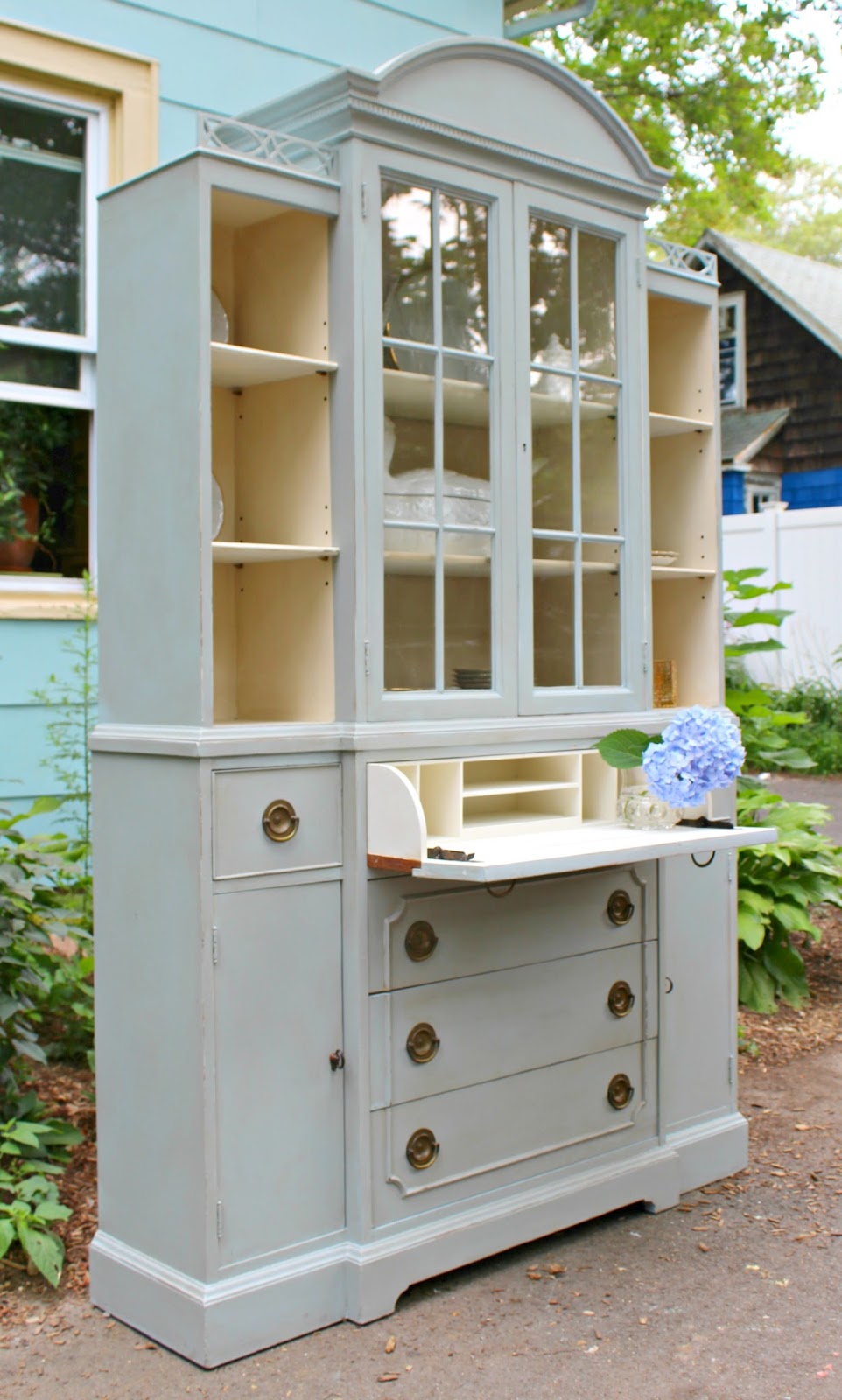 Heir and Space: A Vintage Mahogany Breakfront in Gray