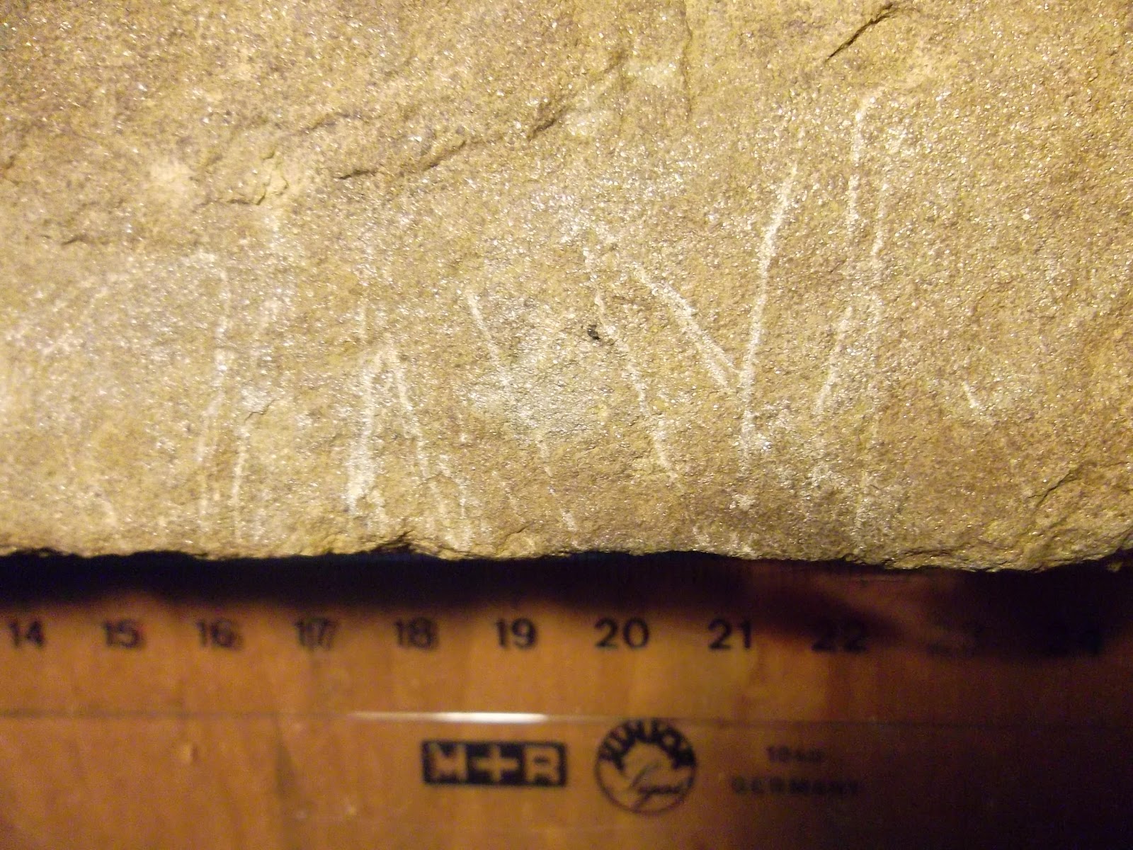 Archaeology of Portable Rock Art: Incised lines on stone material at ...