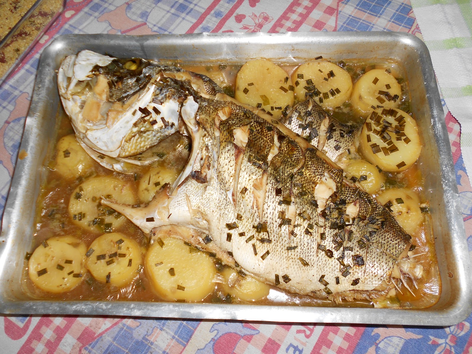 CAIAQUE-PALMAS: RECEITA DE TUCUNARÉ ASSADO