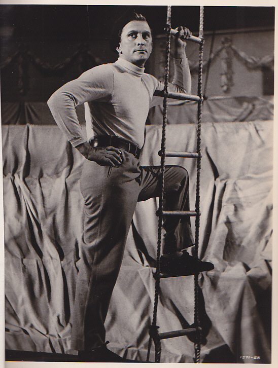 Circus History: Kirk douglas holding trapeze ladder
