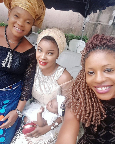 Prince Iyke Olisa and wife dedicate their daughter in church